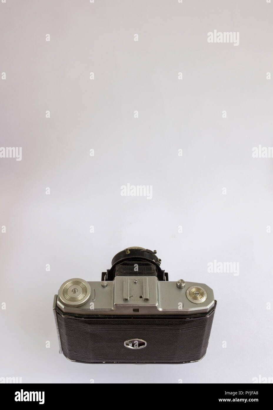 view from above and behind of an old 120 film folding film camera, with ...