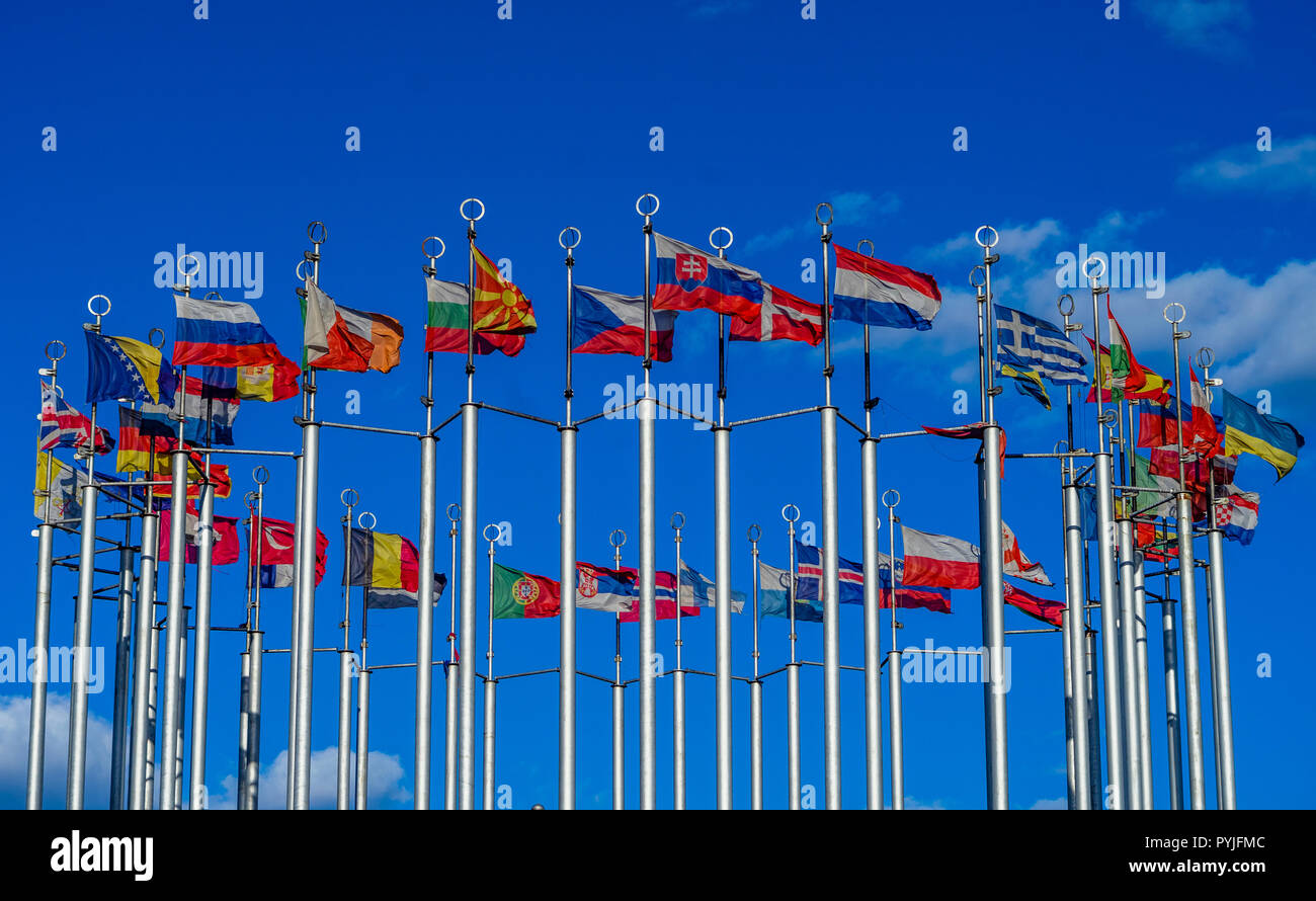 Flags of European countries on flagpoles against the blue sky Stock ...