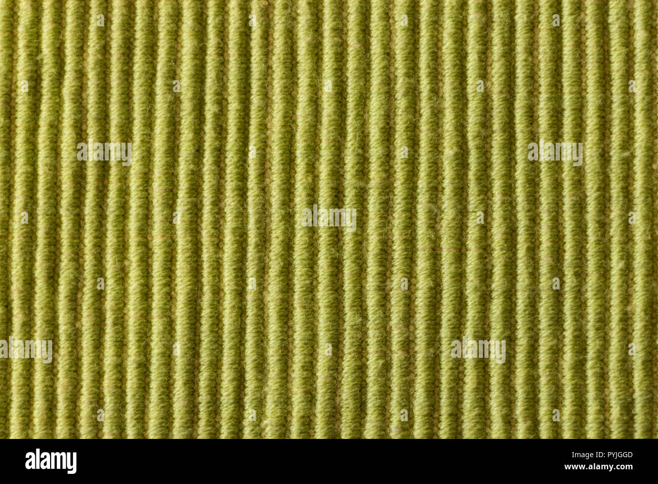 Green fabric, vertical texture - close-up Stock Photo - Alamy