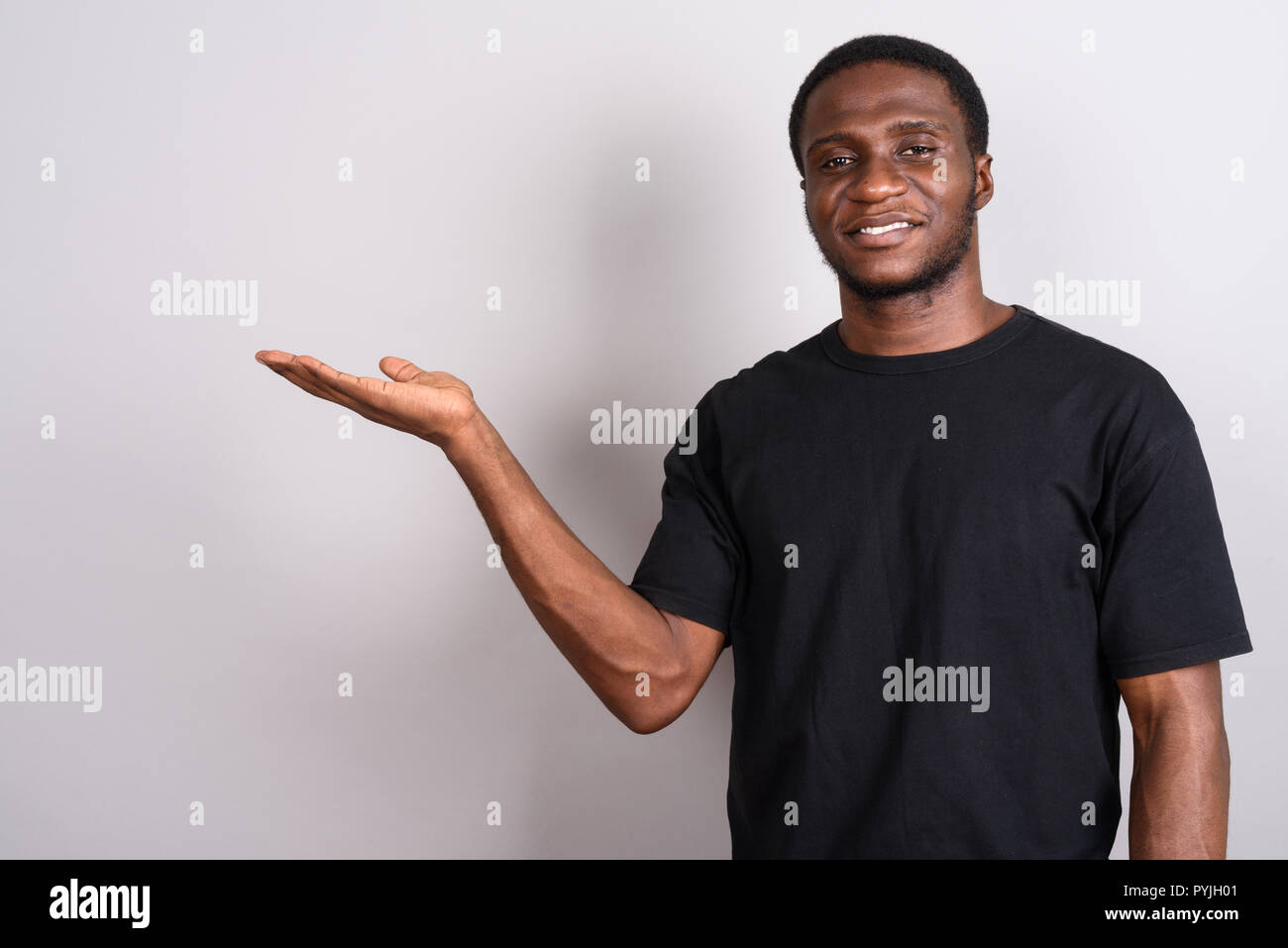 Black man hand holding hi-res stock photography and images - Alamy