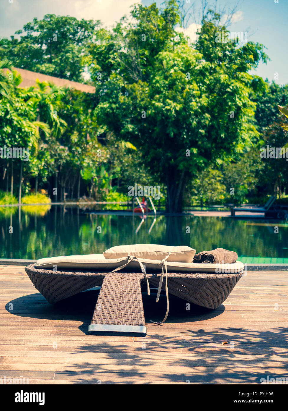 luxury swimming pool at tropical hotel resort, relaxing and leisure ...