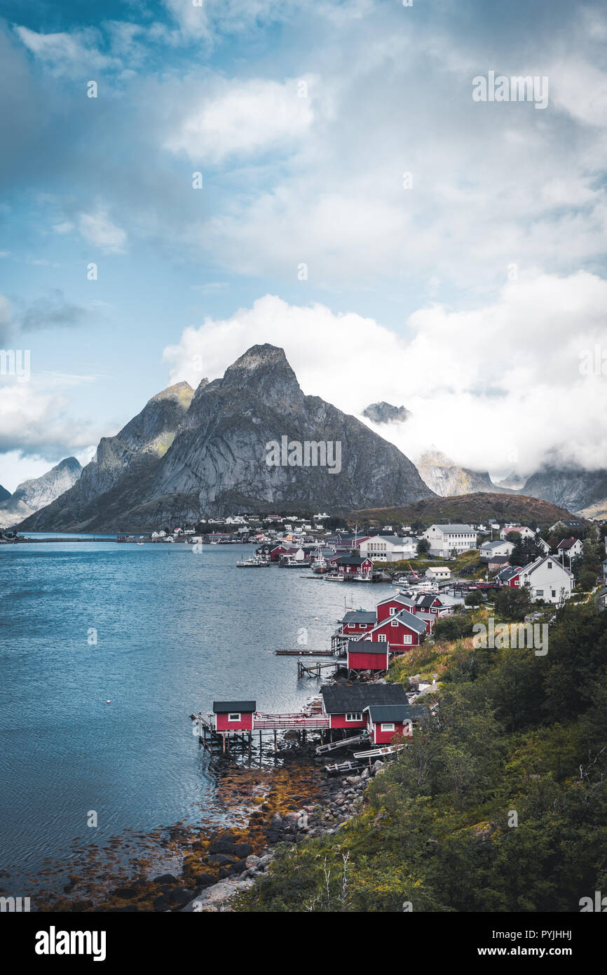 Landscape of fishing village Reine with the Reine Fjord during sunset ...