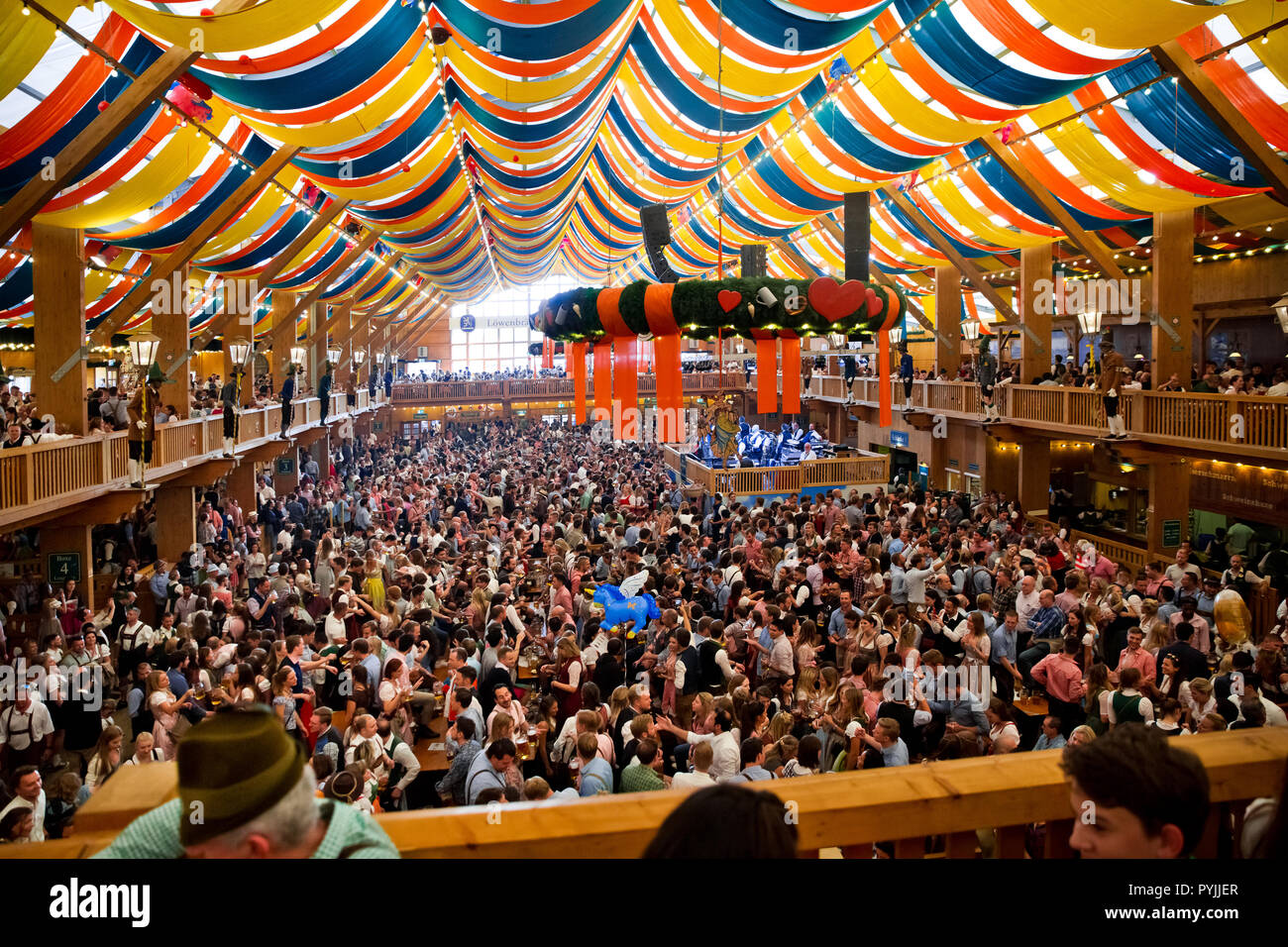 Oktoberfest munich lowenbrau beer tent hi-res stock photography and ...