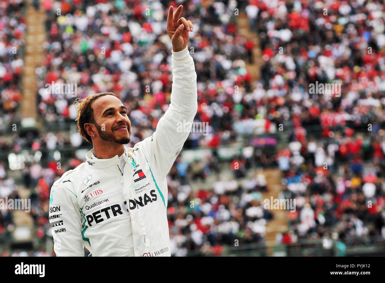 Mercedes' Lewis Hamilton celebrates winning the Formula One drivers ...