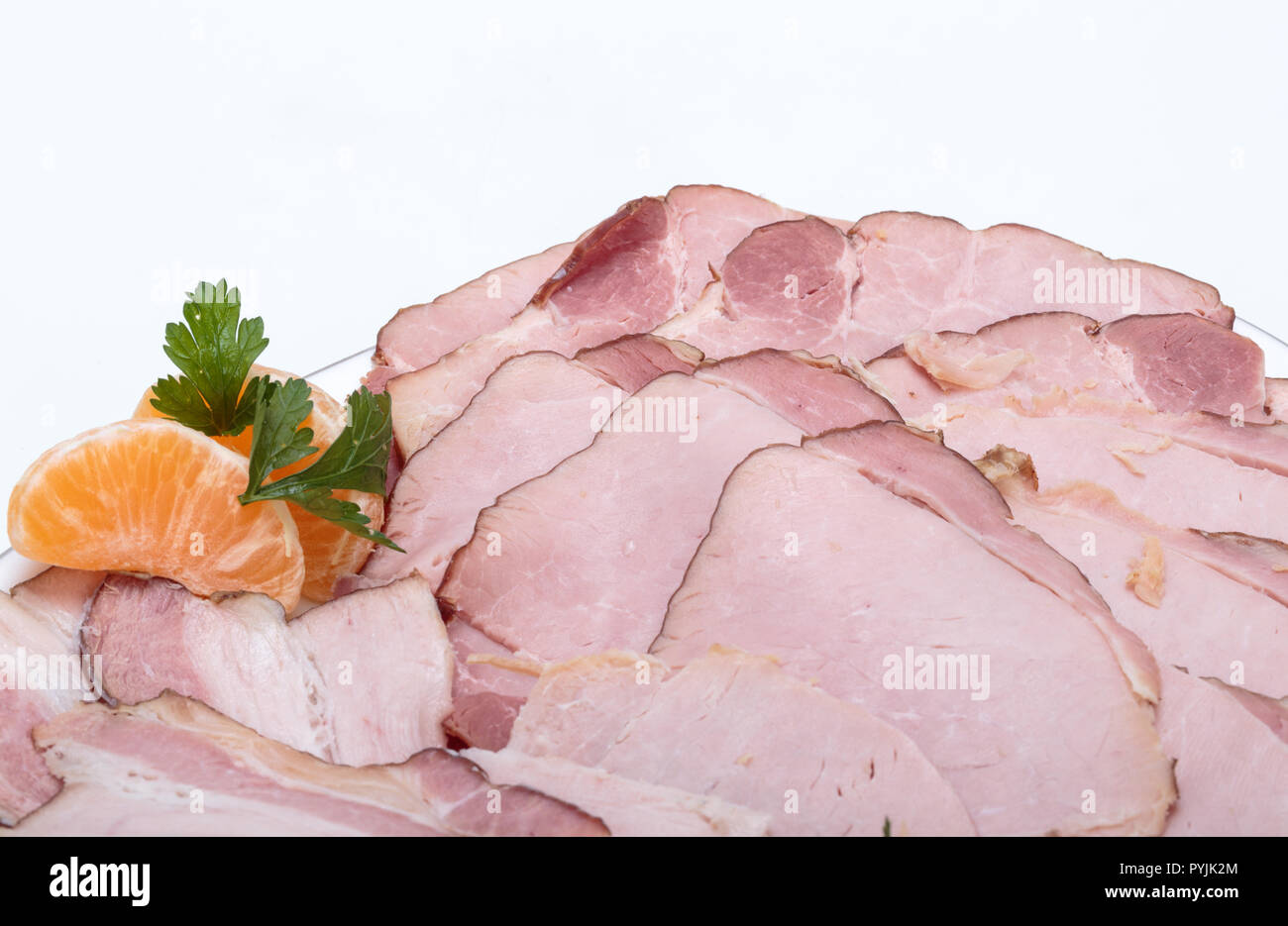 Plate of smoked meat isolated on white background Stock Photo - Alamy