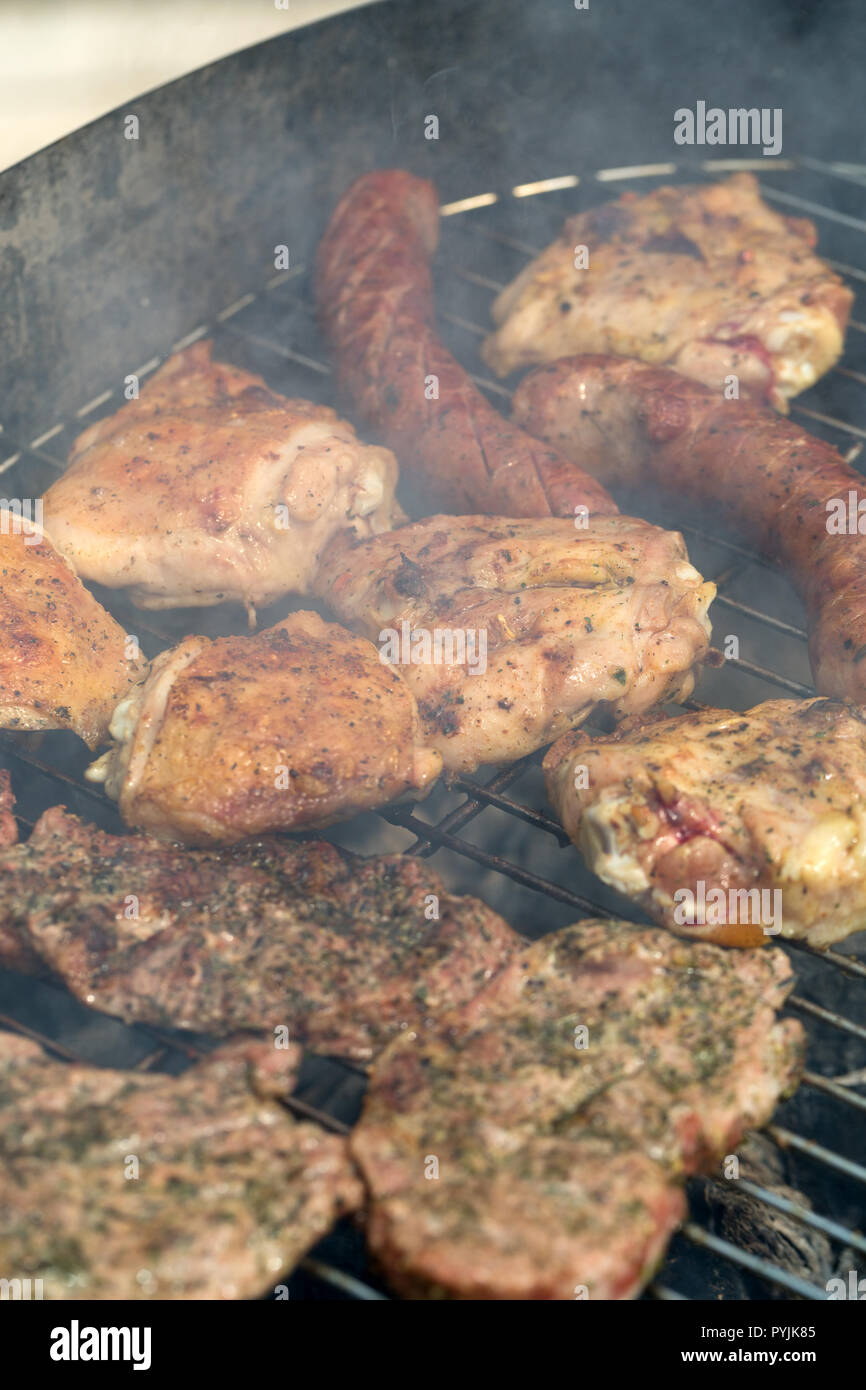 barbecue with delicious grilled meat on grill Stock Photo - Alamy