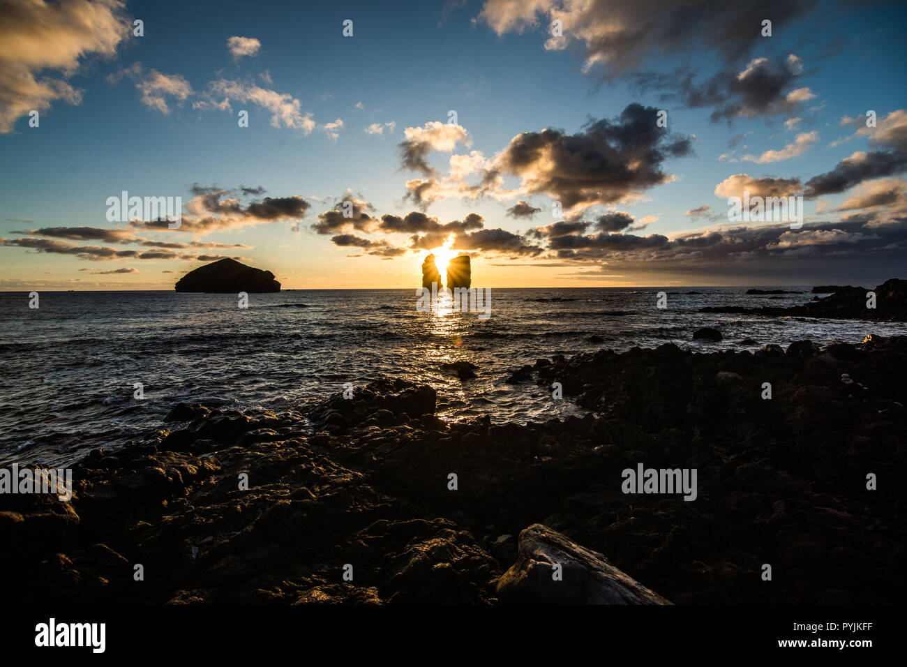 Amazing sunset at the beach of Mosteiros with its islets, Azores ...