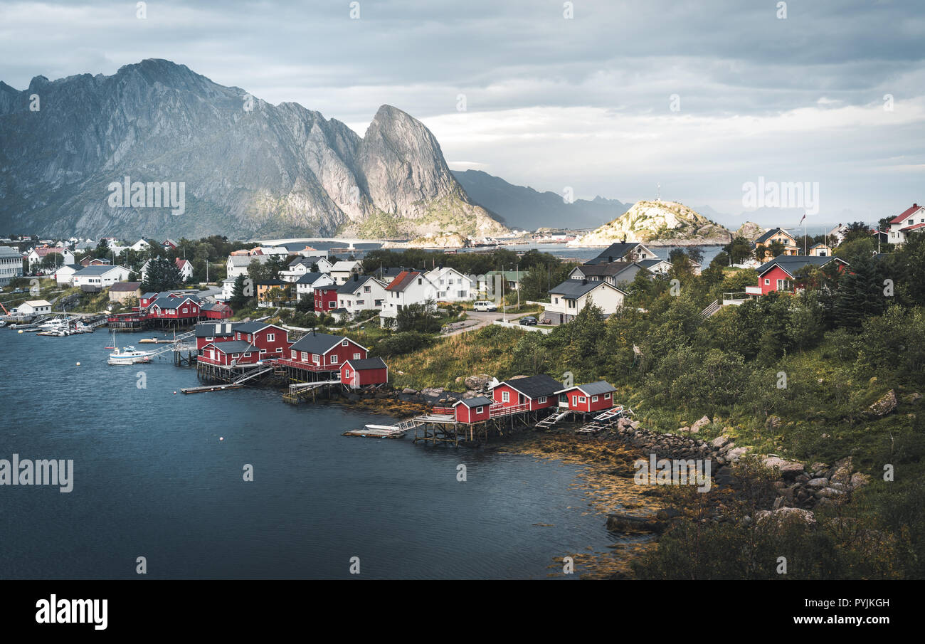 Landscape of fishing village Reine with the Reine Fjord during sunset ...