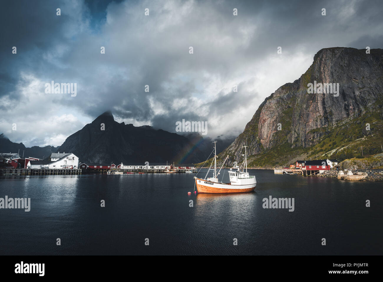 Reine, September 2018: Ship with rainbow in the background in the ...