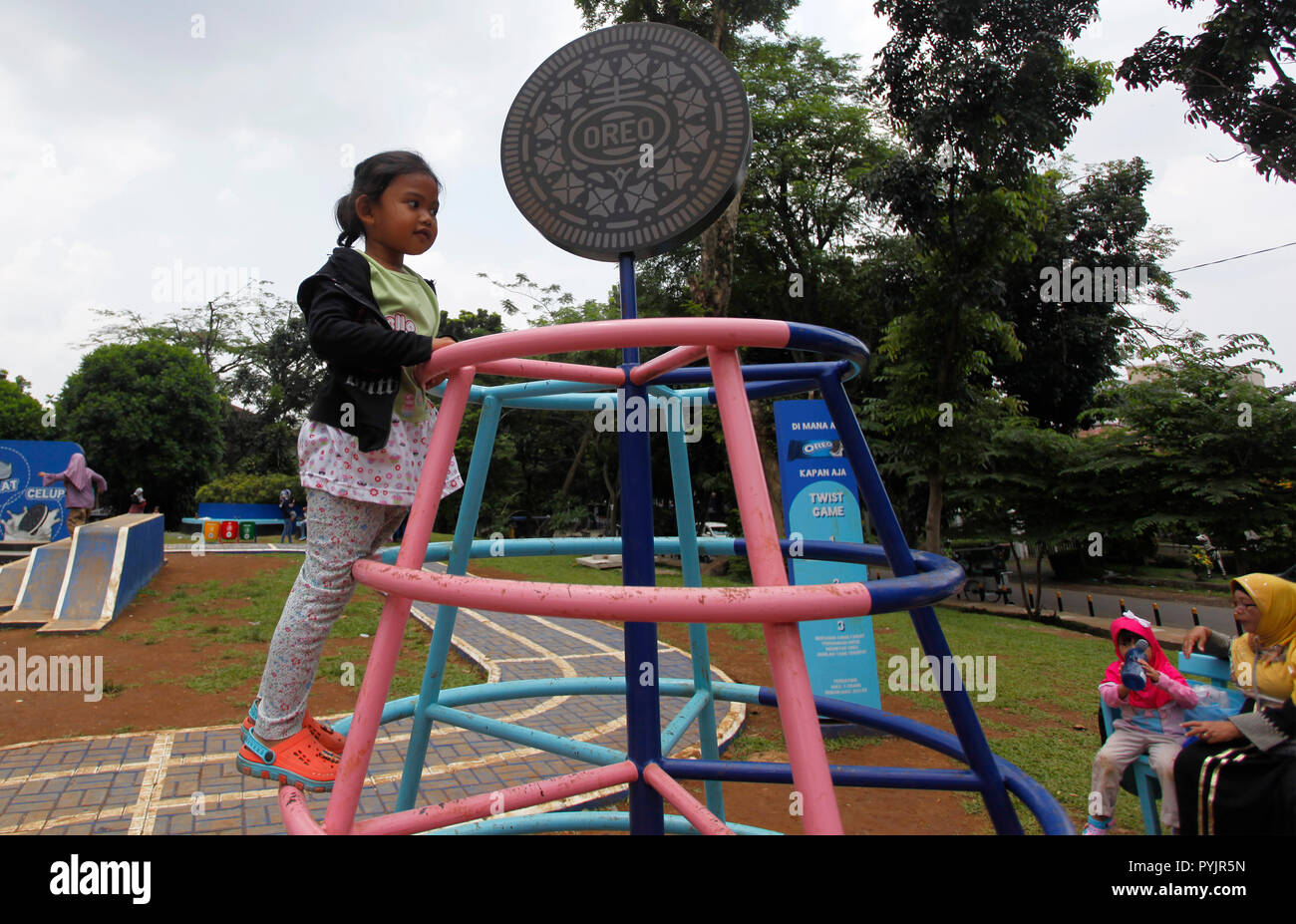 A girl seen climbing in the Oreo Park. The Oreo Park is equipped with ...