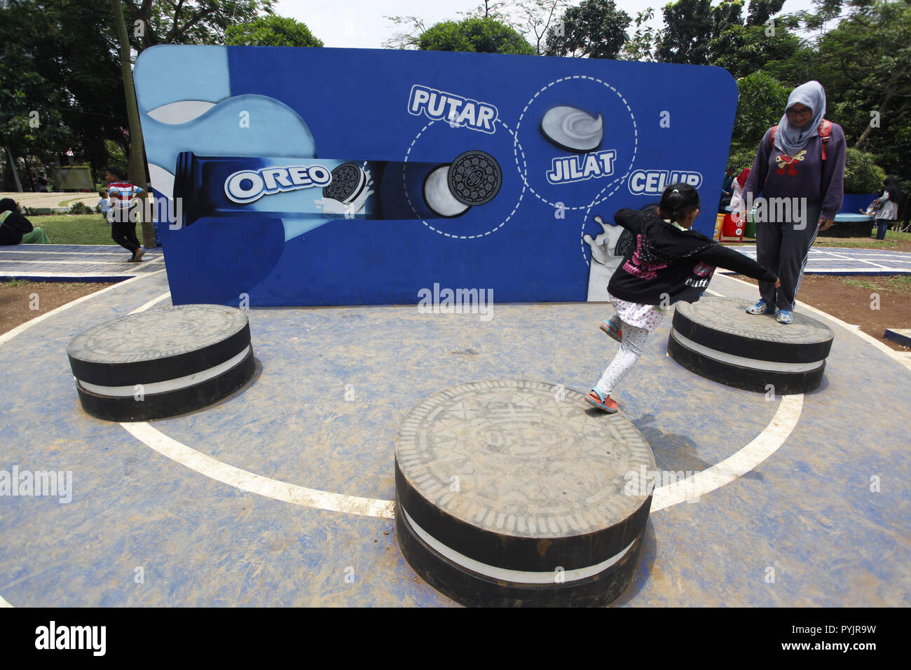 Bogor, West Java, Indonesia. 28th Oct, 2018. A child seen playing with ...