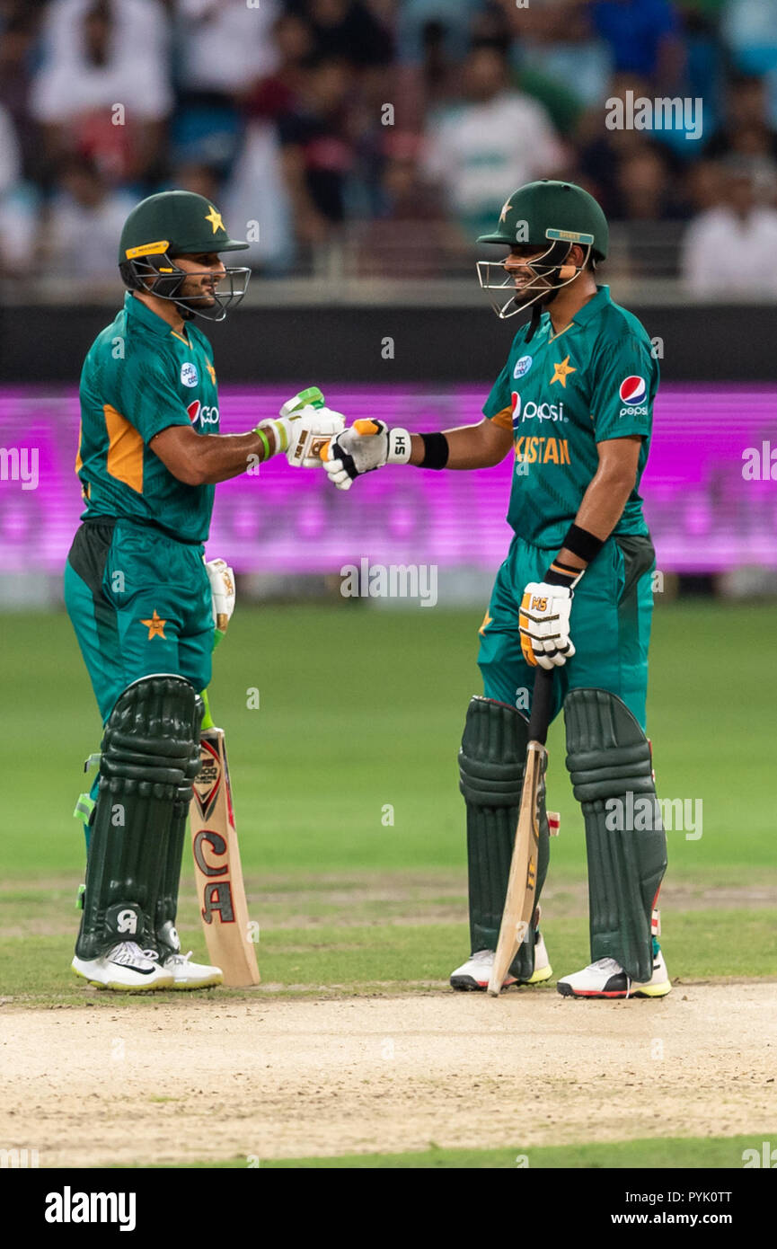 Dubai, UAE. 28th Oct, 2018. Sahibzada Farhan (left) and Babar Azam of ...