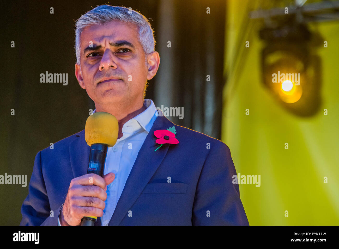 London, UK. 28th Oct, 2018. Sadiq Khan speaks wearing a poppy make of ...