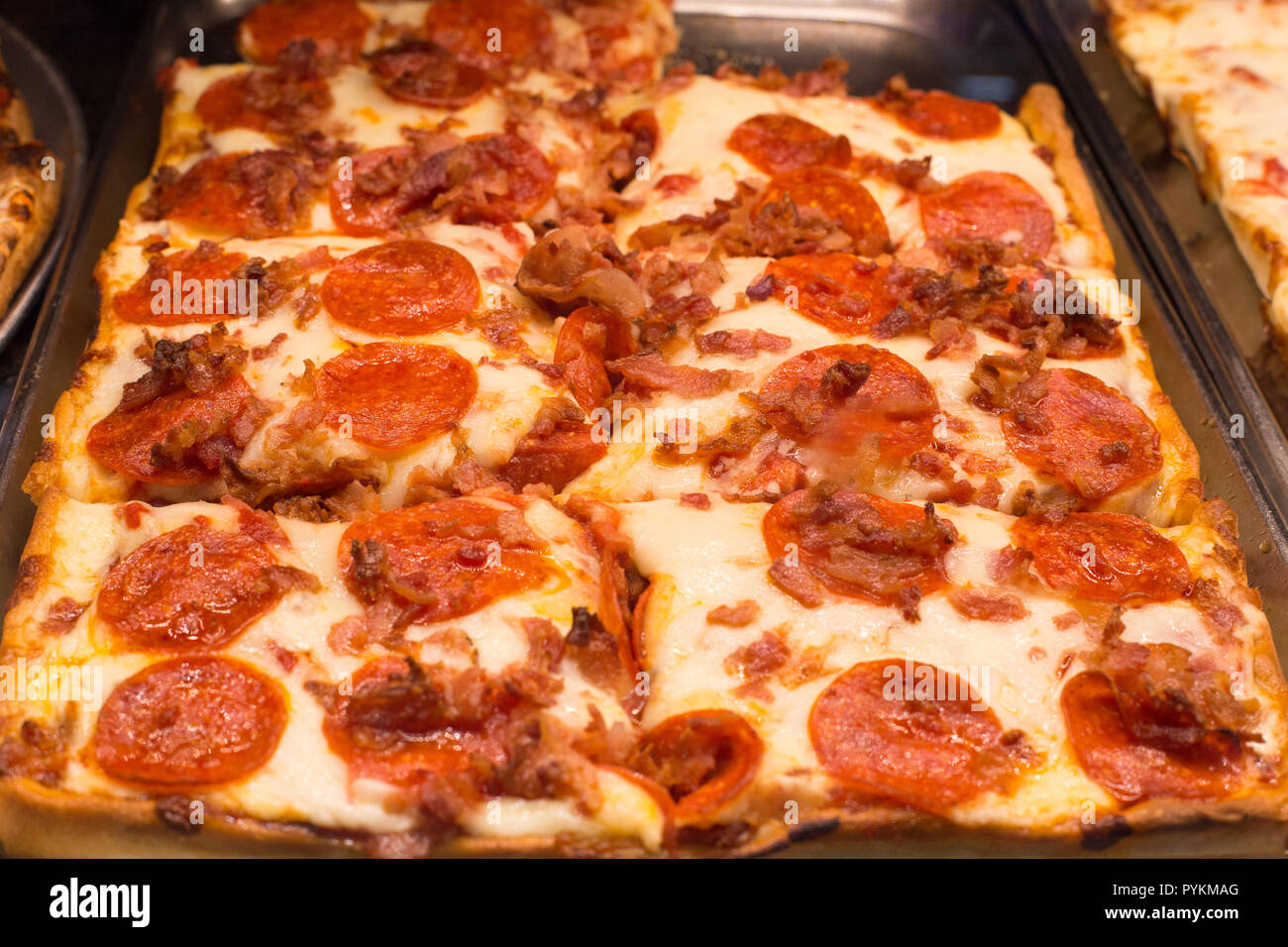 Authentic Italian New York City style pizza in window display Stock ...