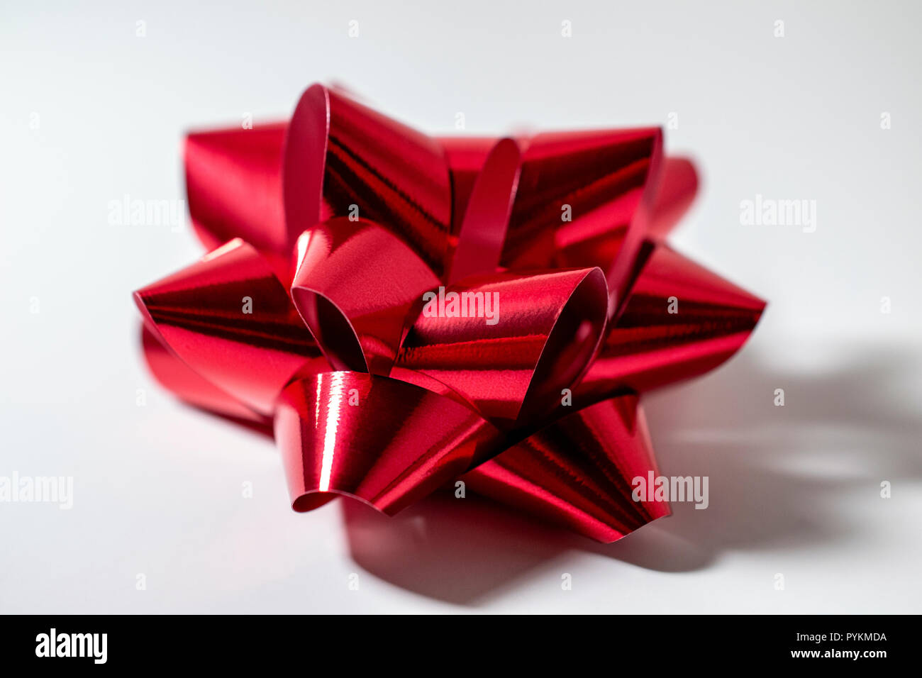 A Single Christmas Red Holiday Satin Bow. Light White Background. Room ...