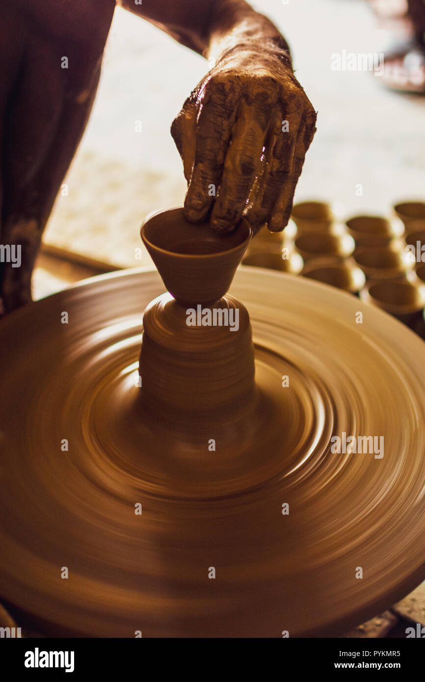 Unfinished Clay tea pot on Pottery wheel with selective focus Stock ...