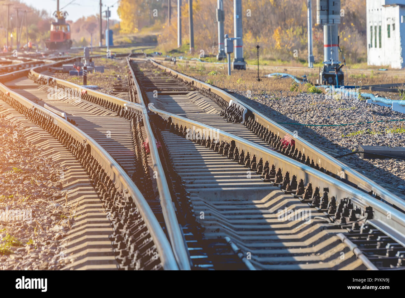 arrow rail rails sunny day Stock Photo - Alamy