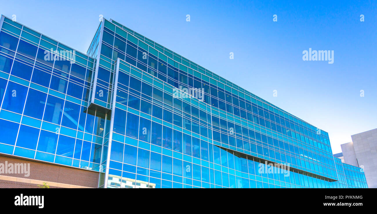 Blue glass on a modern building in Provo Utah Stock Photo - Alamy