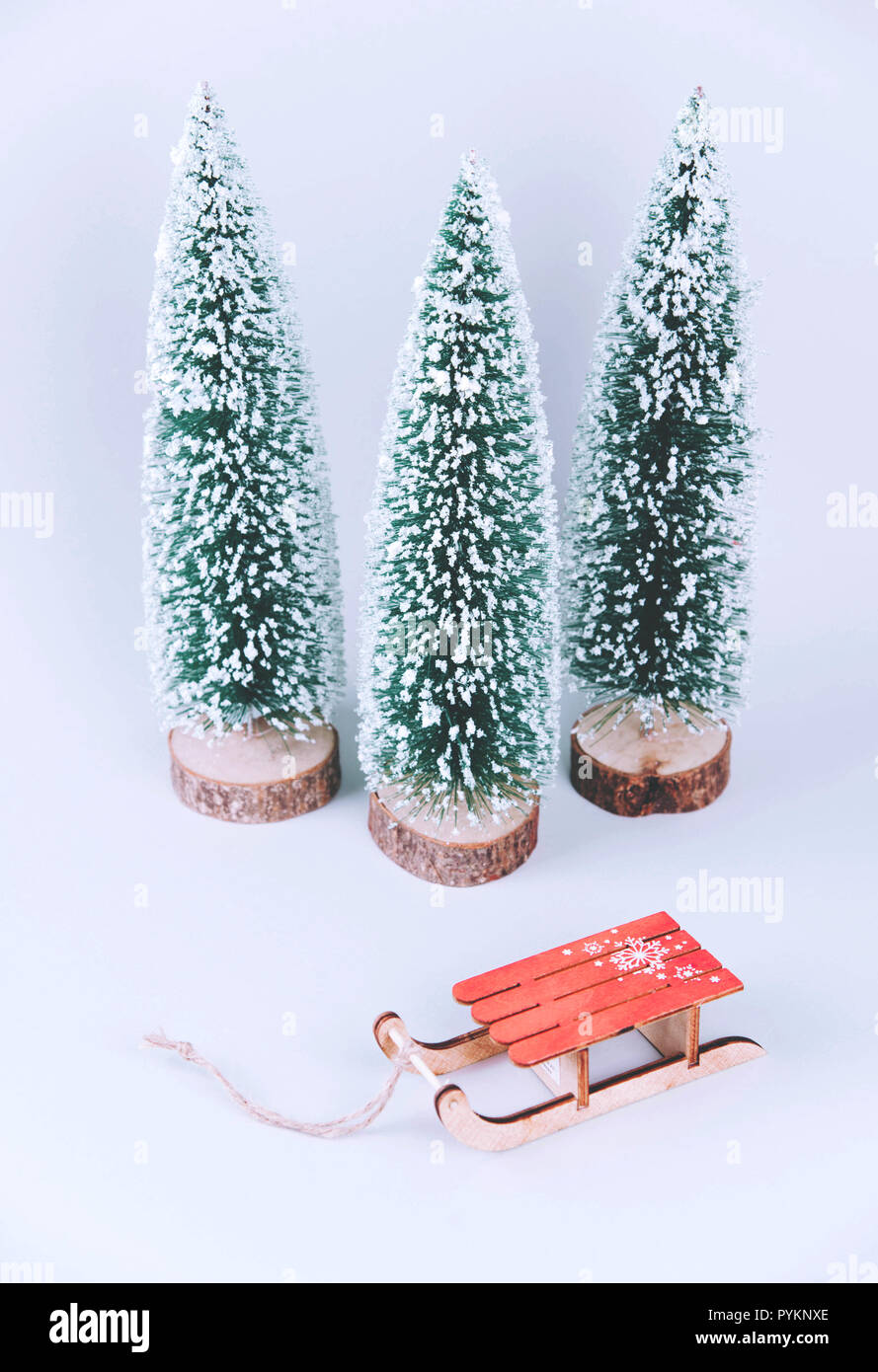 Stylish vintage wooden sled with xmas tree Stock Photo - Alamy