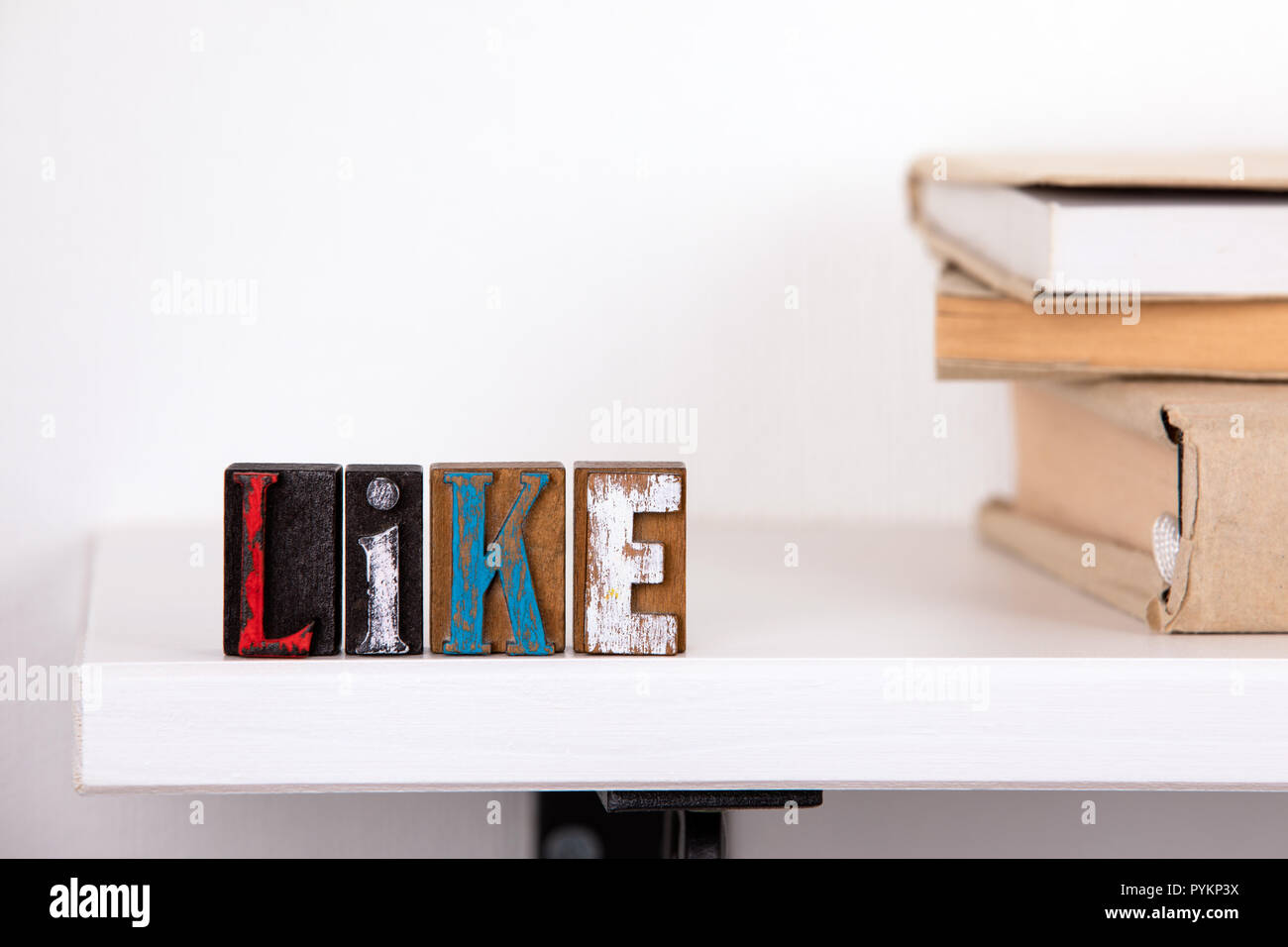 Like word from colored wooden letters Stock Photo - Alamy