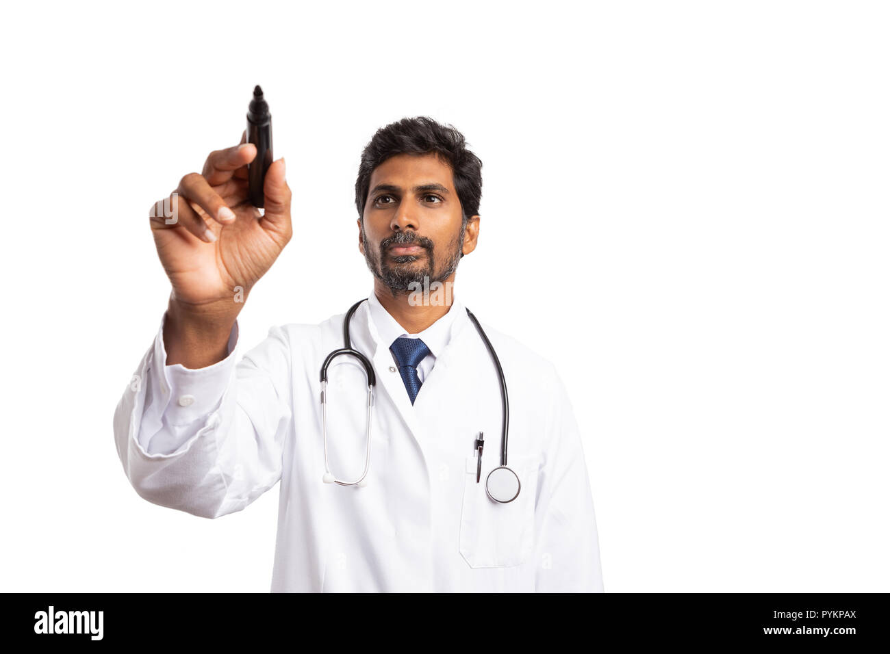 Indian doctor writing with marker on transparent screen as copyspace ...