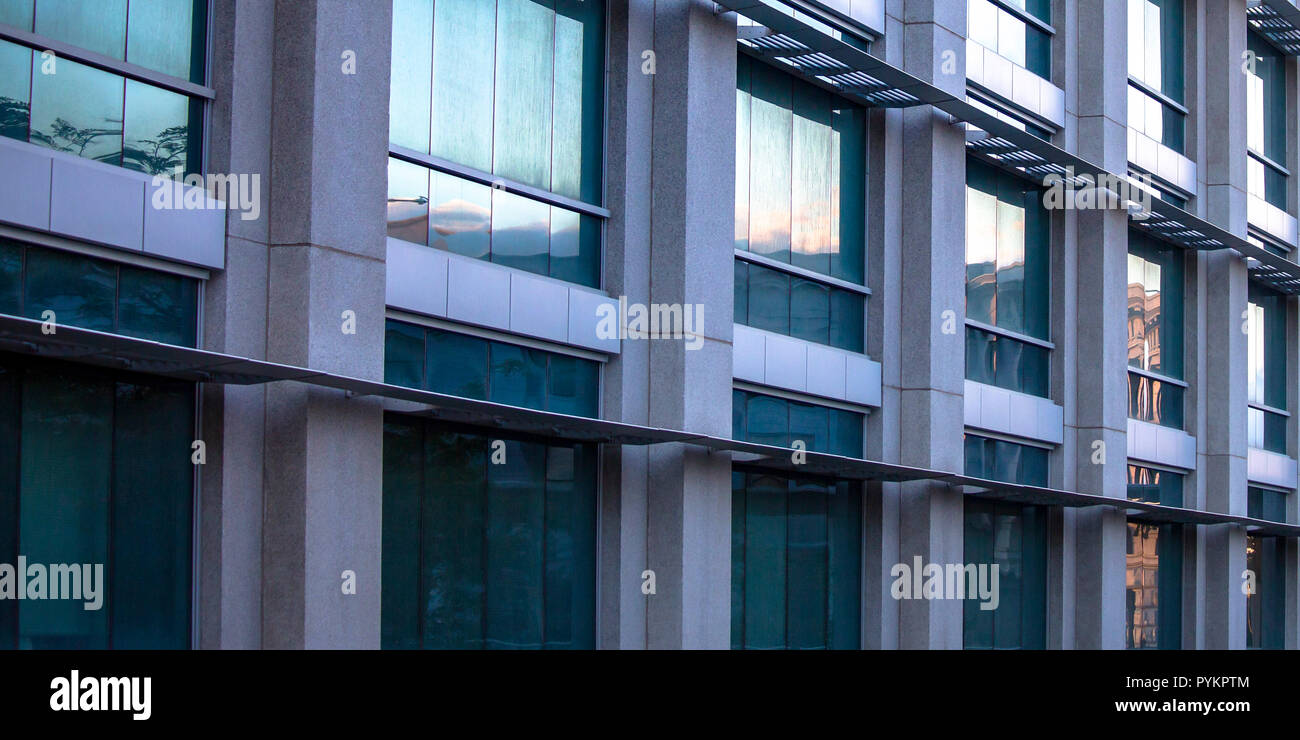 Reflective glass windows on a modern building Stock Photo - Alamy