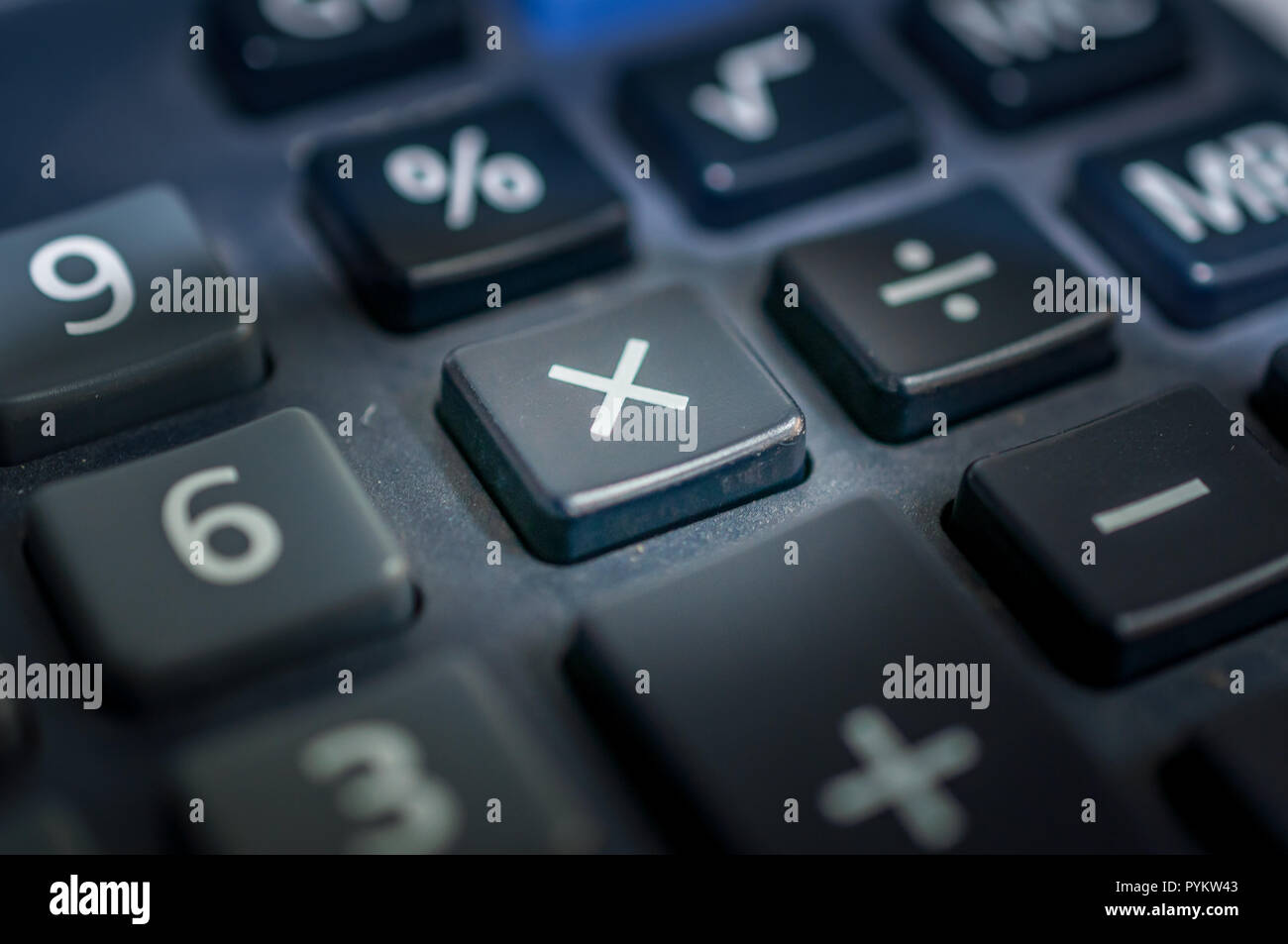 multiply button on a calculator Stock Photo - Alamy