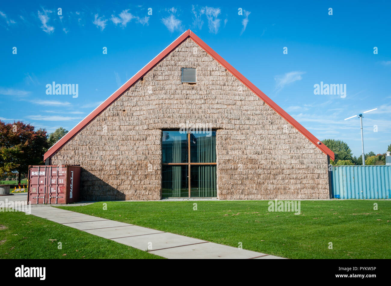 Barn made of hay, big window in the middel Stock Photo - Alamy