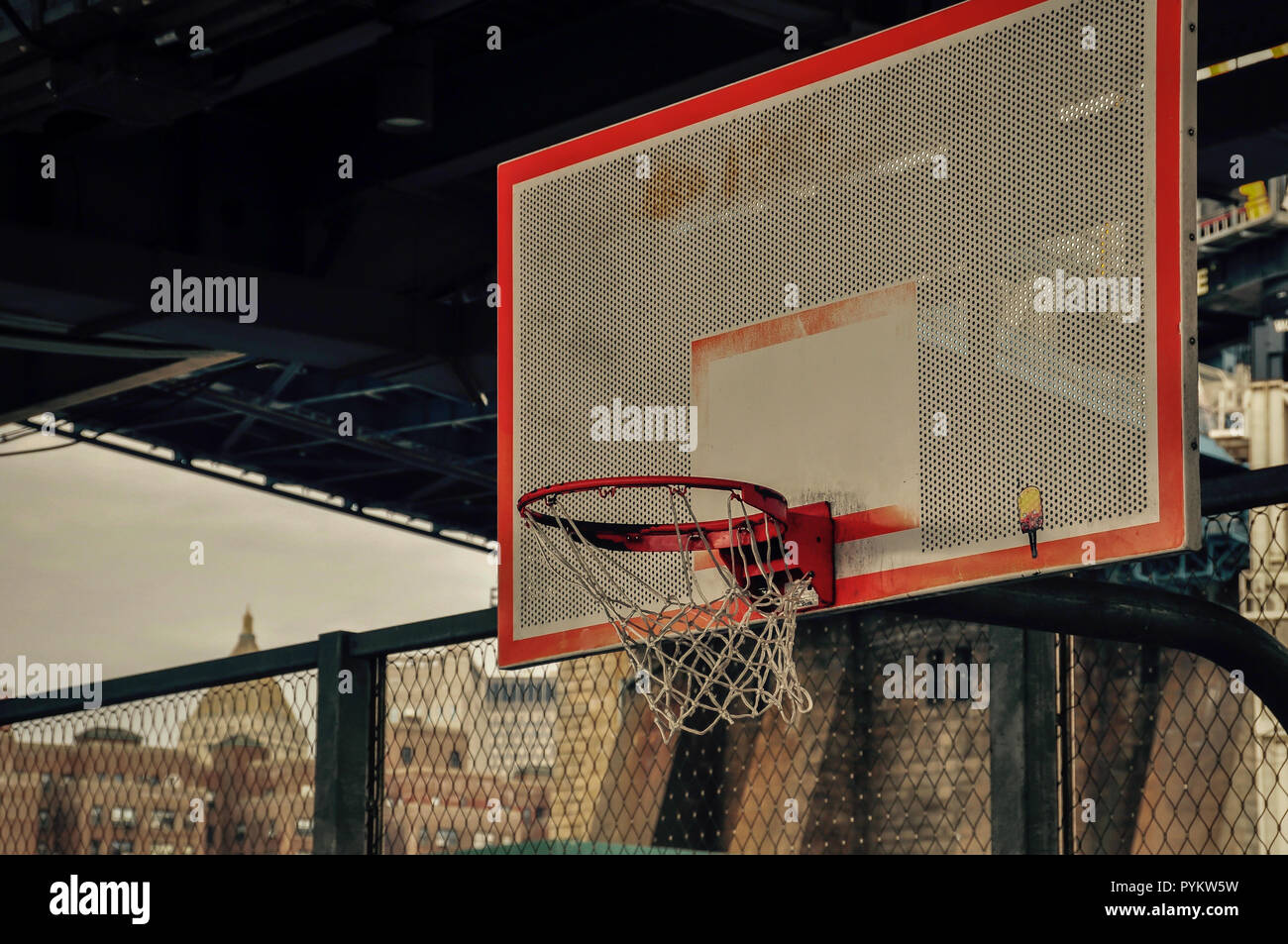 Old basketball net urban style, under a bridge in NY Stock Photo - Alamy