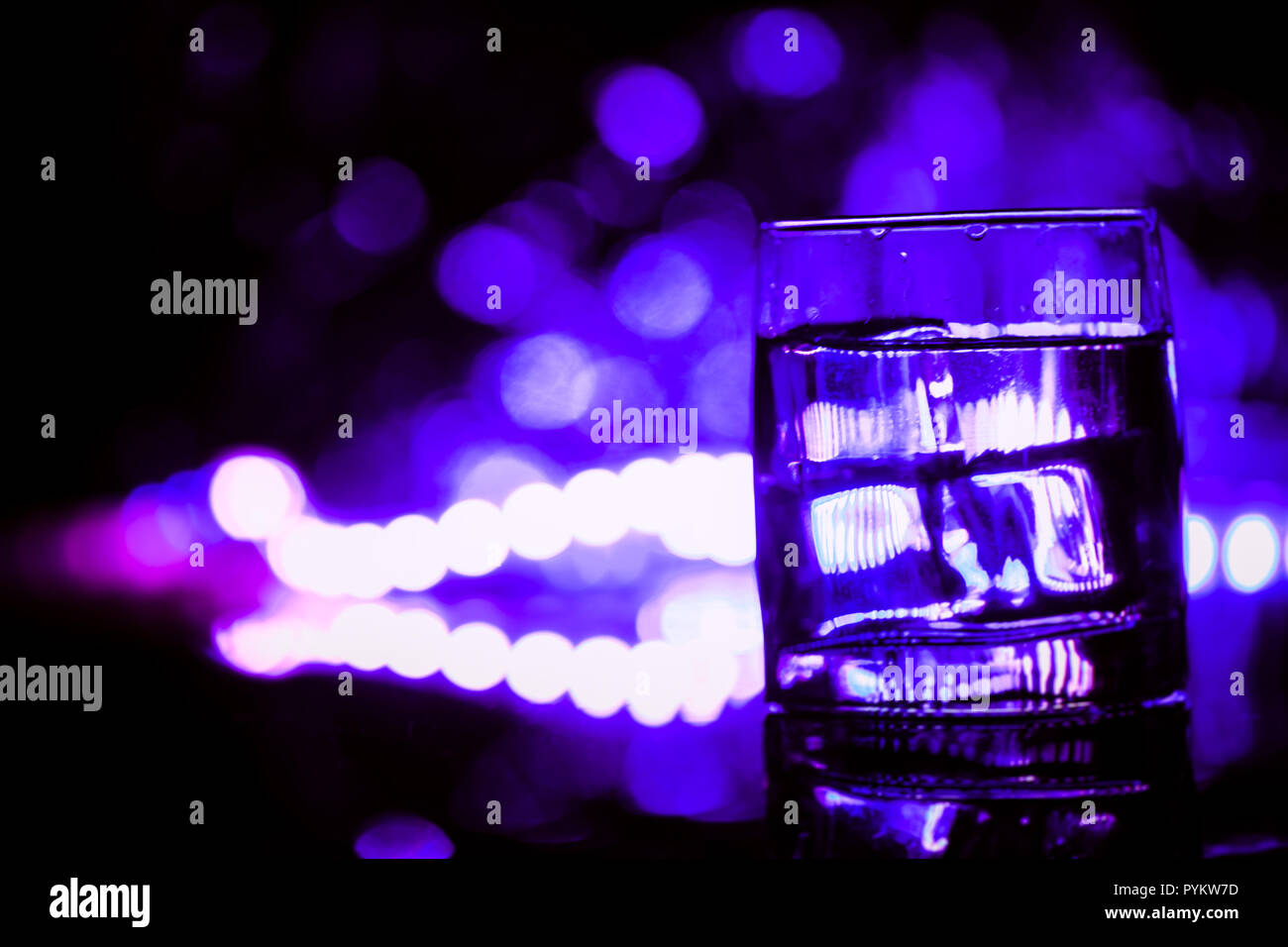 colored lighting of glasses in the night club bar Stock Photo - Alamy