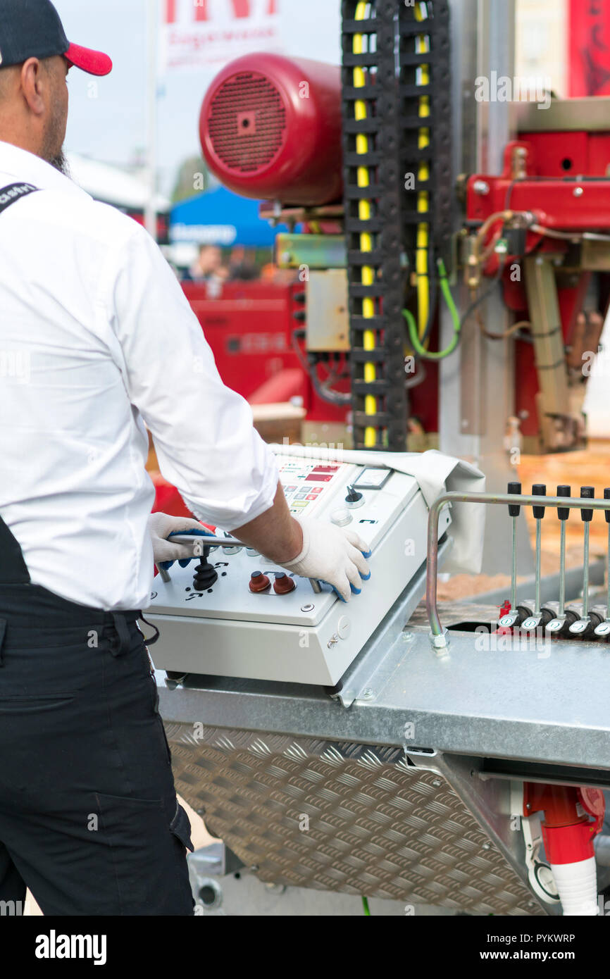 Worker entering data machine hi-res stock photography and images - Alamy