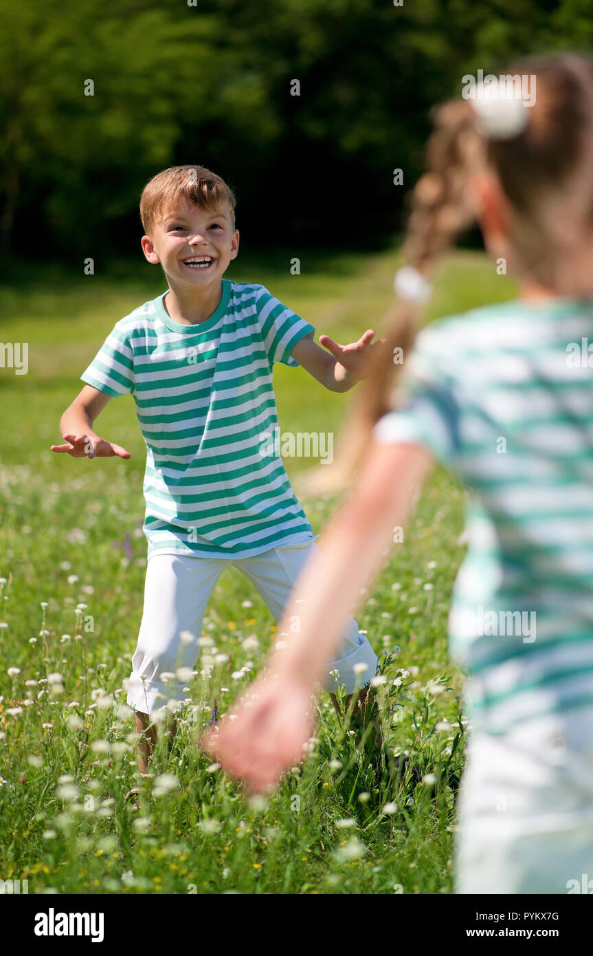 Children playing flying disk Stock Photo - Alamy