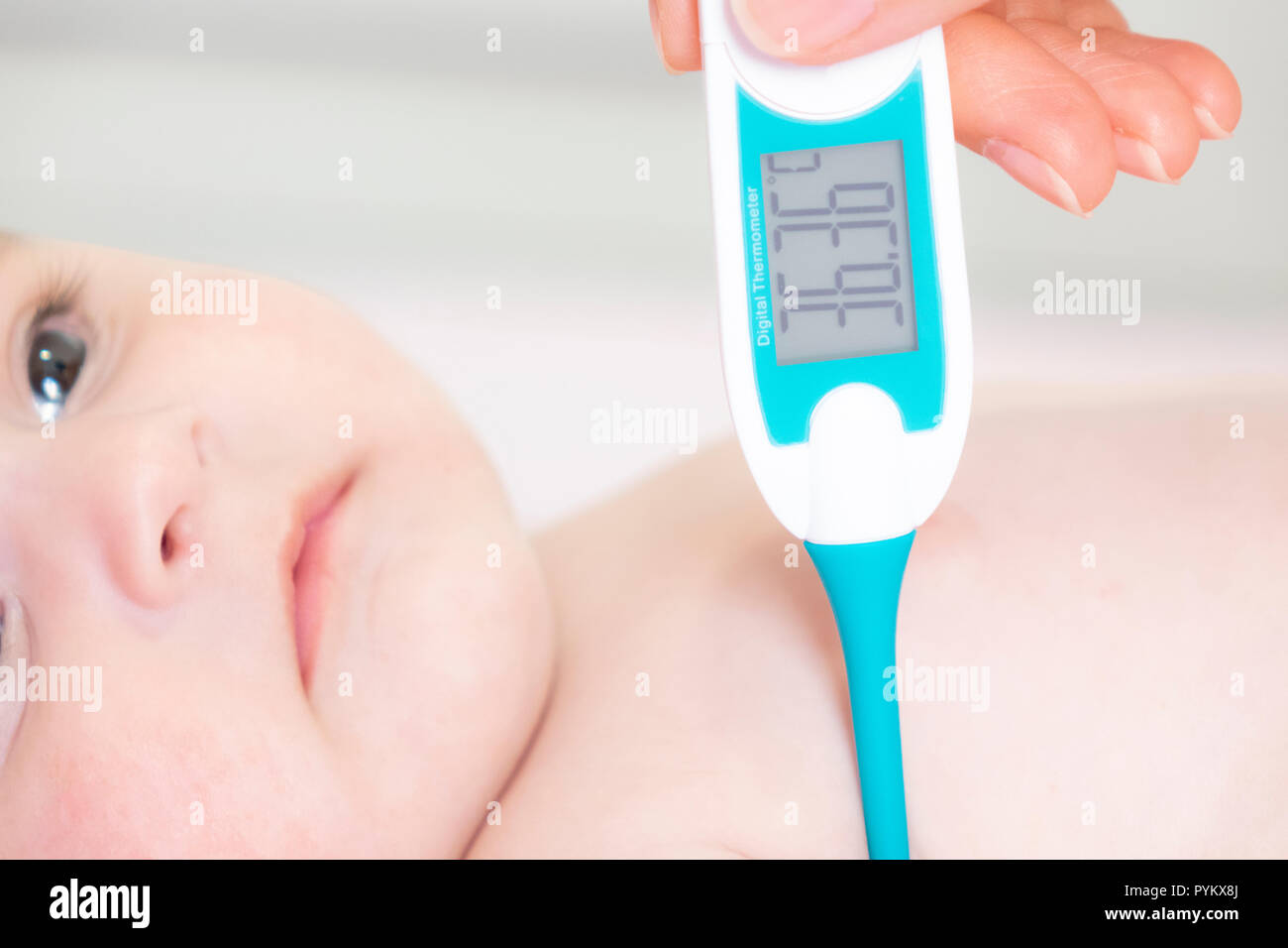 Baby sick with measuring electric thermometer. Child fever ill. Kid ...