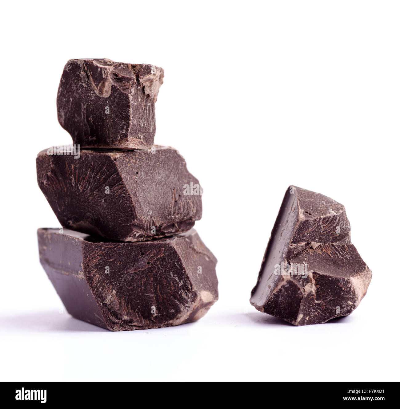 Broken chocolate pieces isolated on white background Stock Photo - Alamy