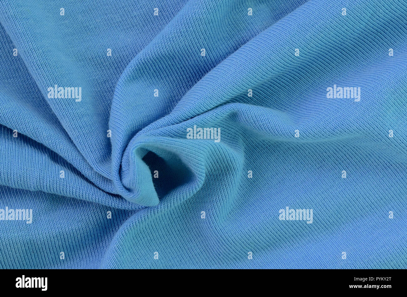 The texture of the fabric in blue color. Material for making shirts and ...