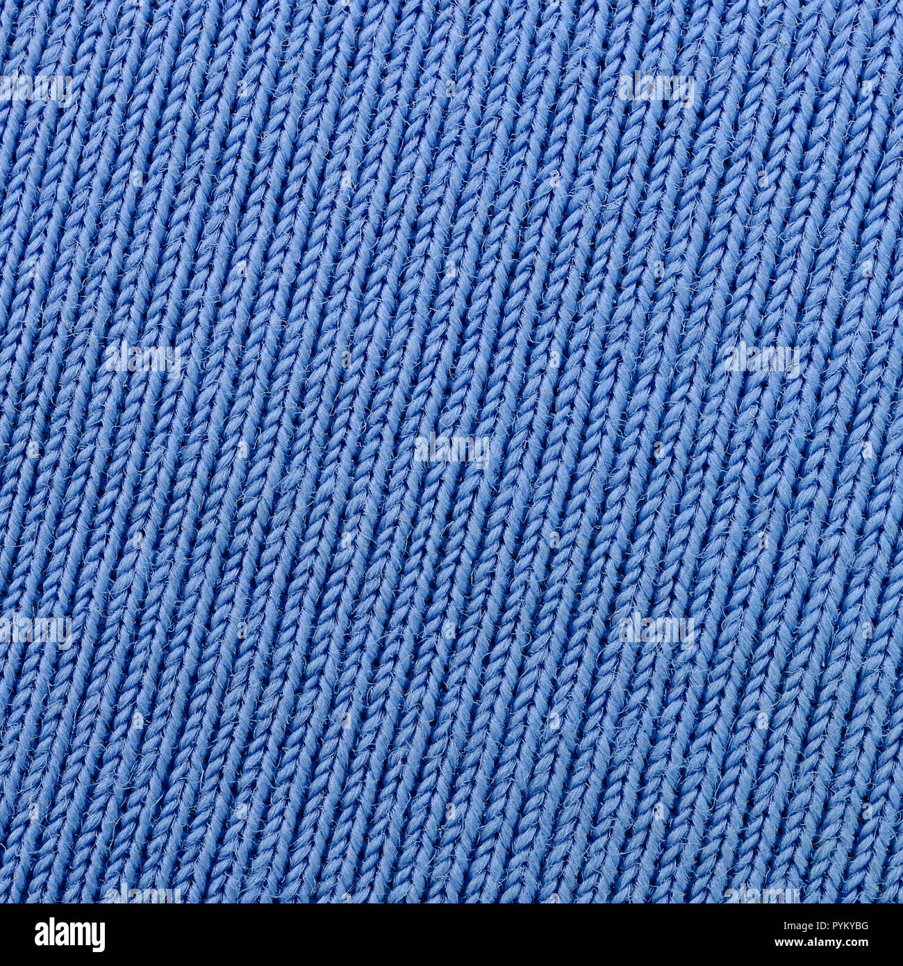 The texture of the fabric in blue color. Material for making shirts and ...