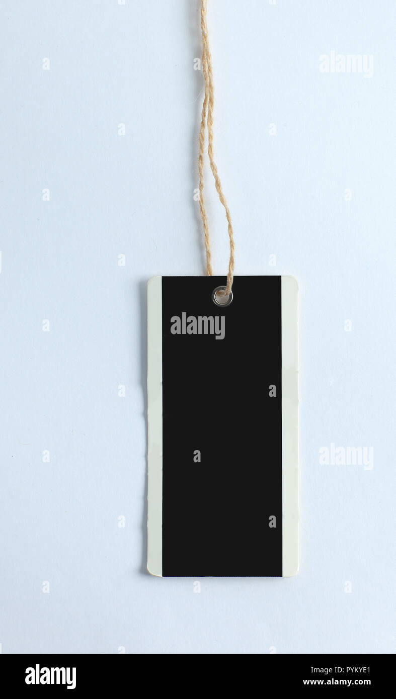 blank decorative tag made of cardboard on a white Stock Photo - Alamy