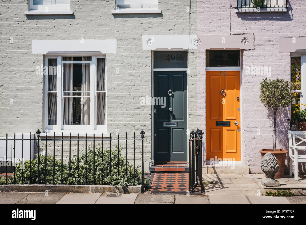 Traditional colourful bright doors on houses in Barnes, London, UK ...