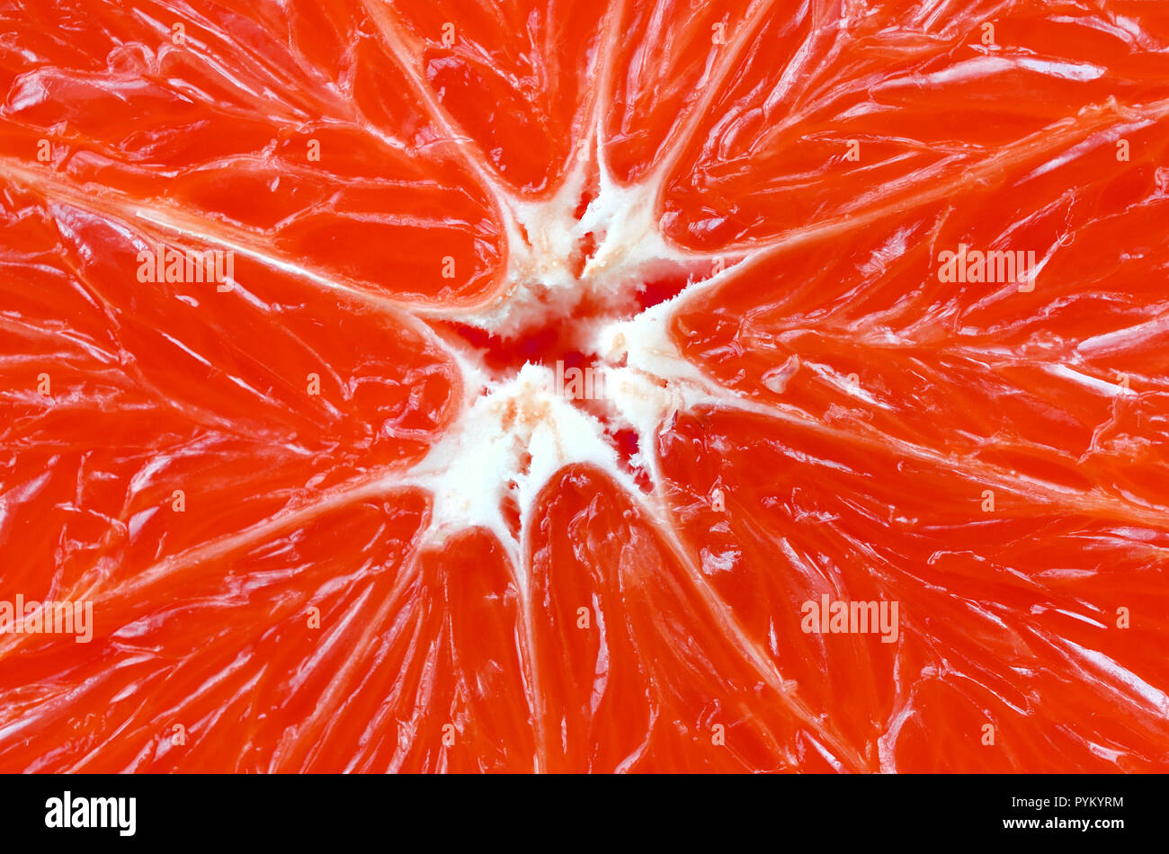 Top view of a fragment of the grapefruit slice close up. Macro background texture Stock Photo ...