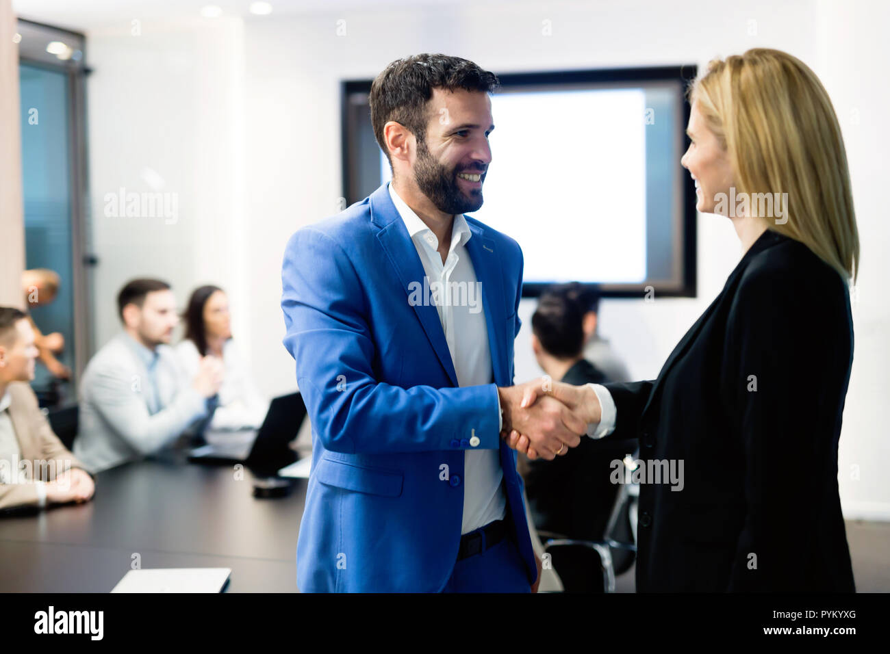 Portrait of business couple in conference room Stock Photo - Alamy