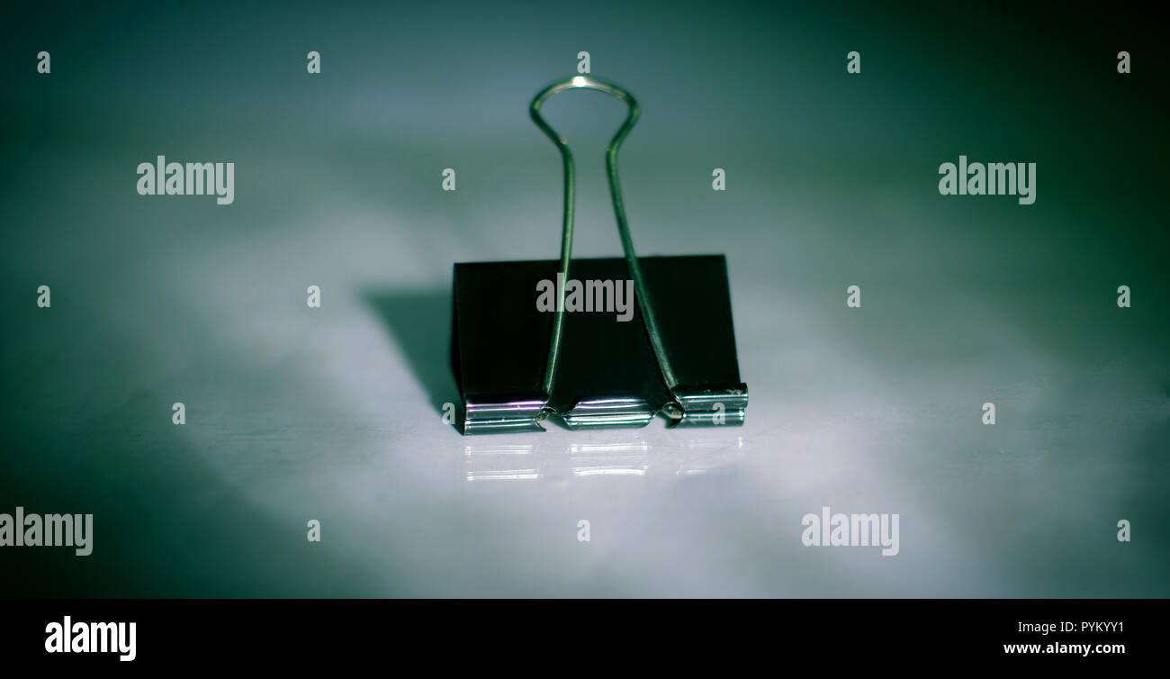 black clip. isolated on a white background Stock Photo - Alamy