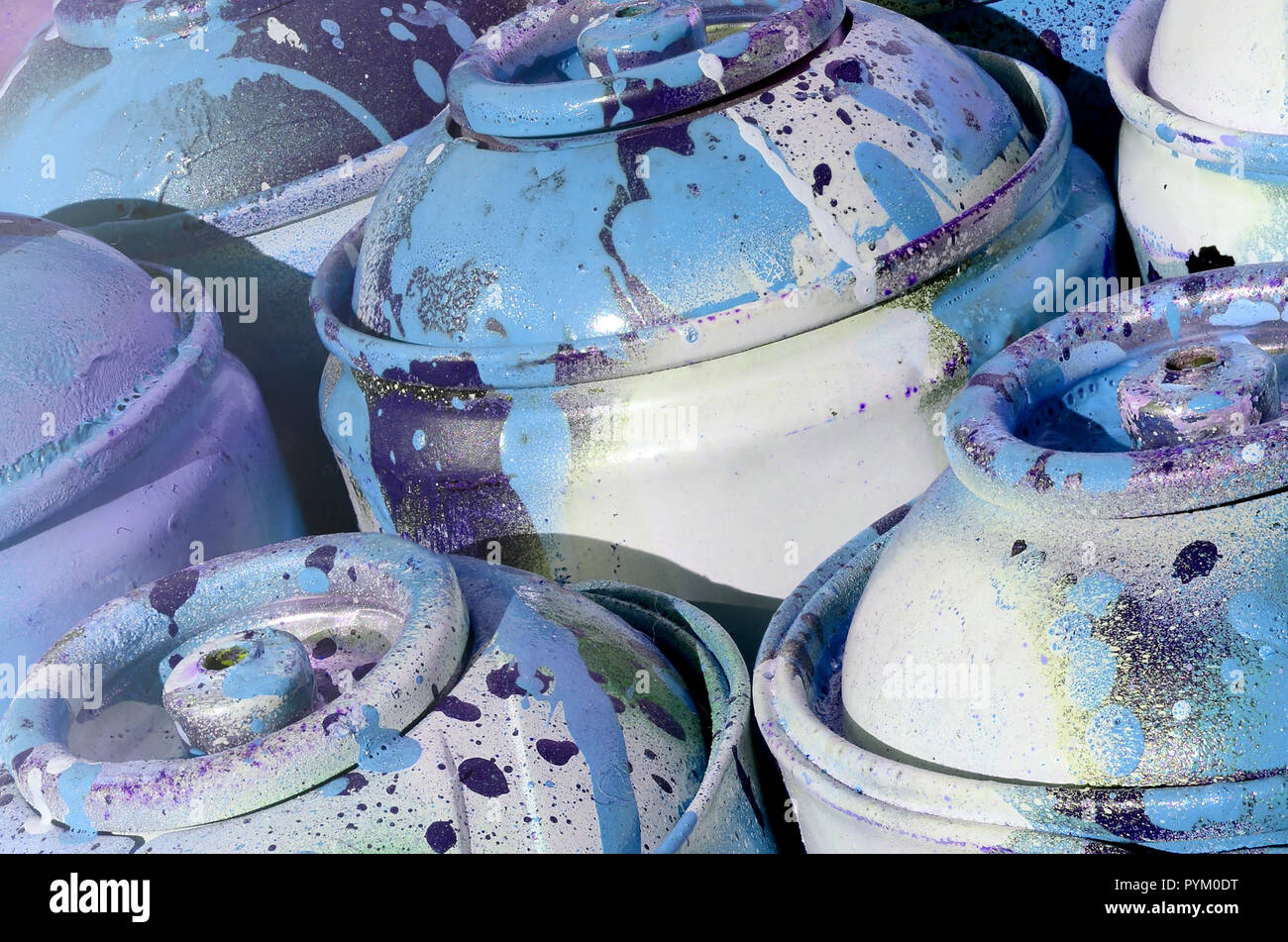 A lot of used blue metal tanks with paint for drawing graffiti Stock ...