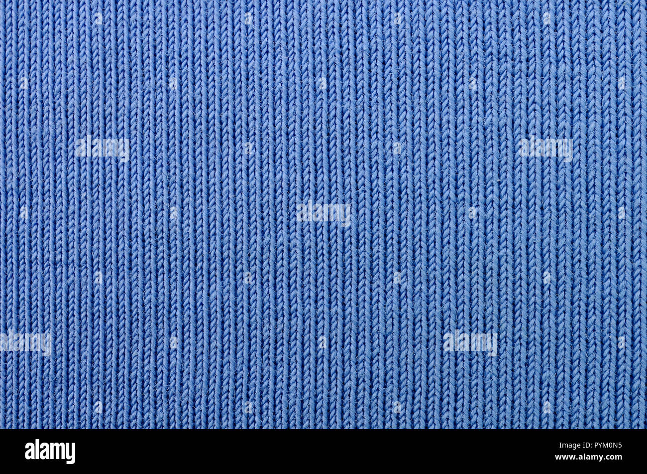 The texture of the fabric in blue color. Material for making shirts and ...