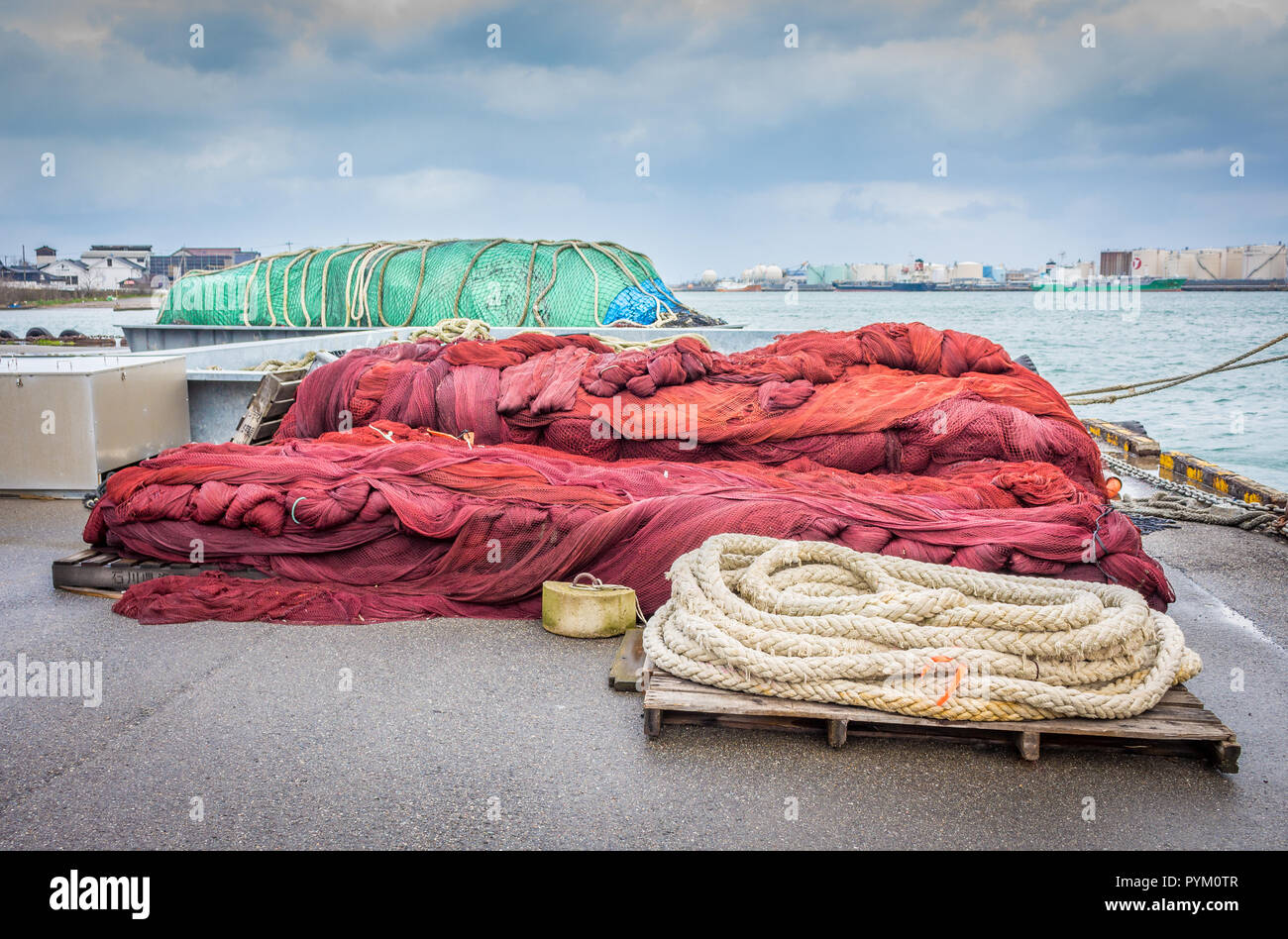 Rope and wrapped cargo at harbour docks, Kanazawa, Japan Stock Photo ...