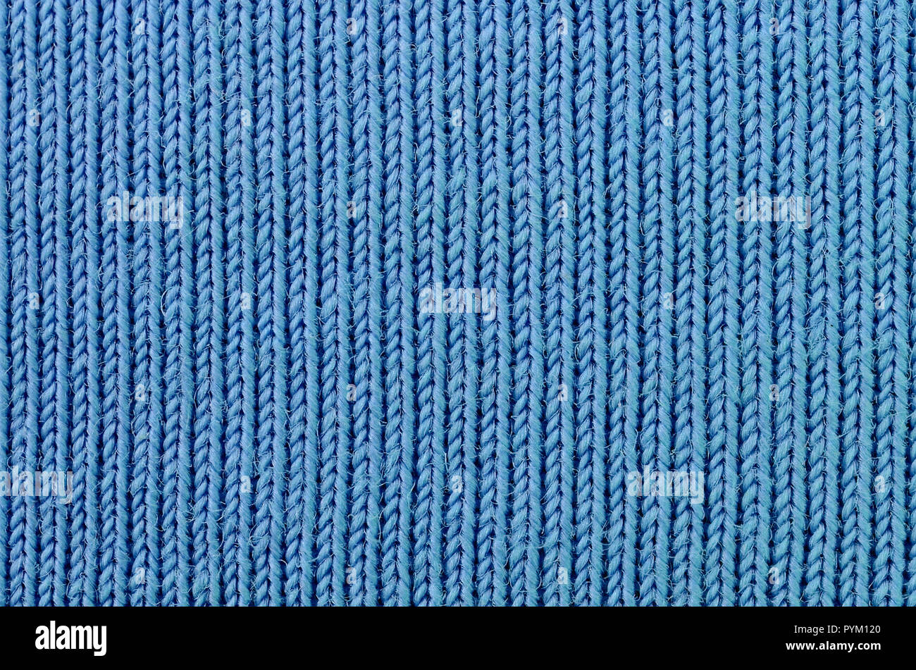 The texture of the fabric in blue color. Material for making shirts and ...