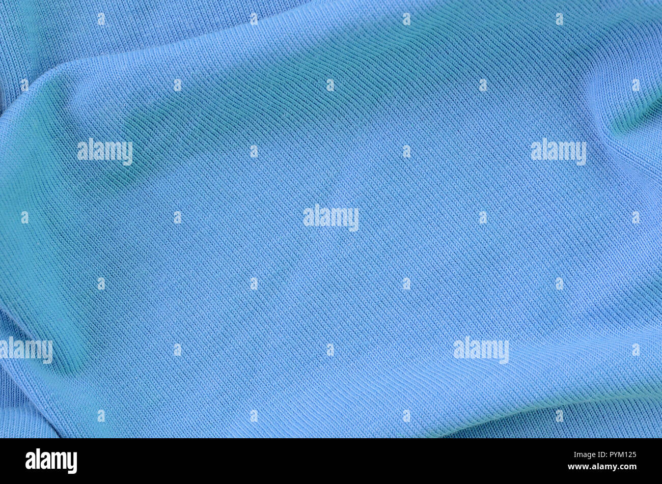 The texture of the fabric in blue color. Material for making shirts and ...