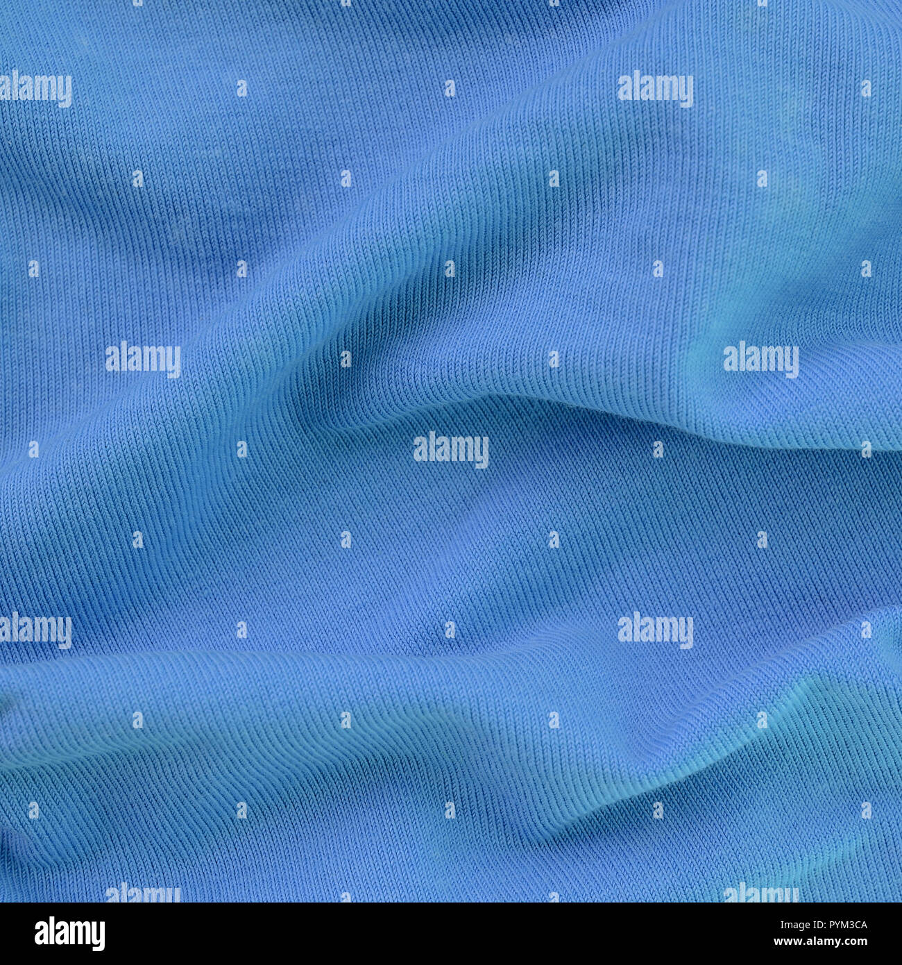 The texture of the fabric in blue color. Material for making shirts and ...