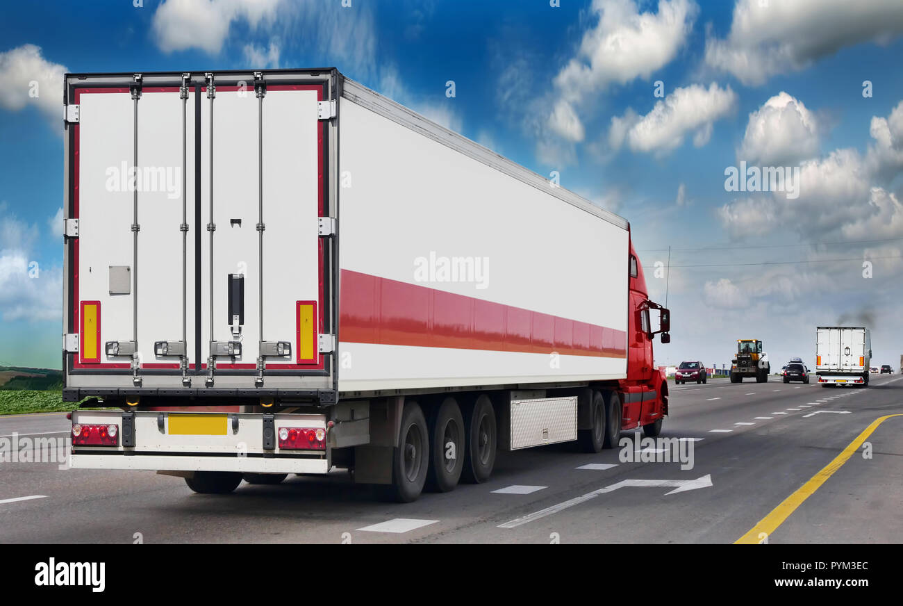 Container on the big highway. transport loads Stock Photo - Alamy