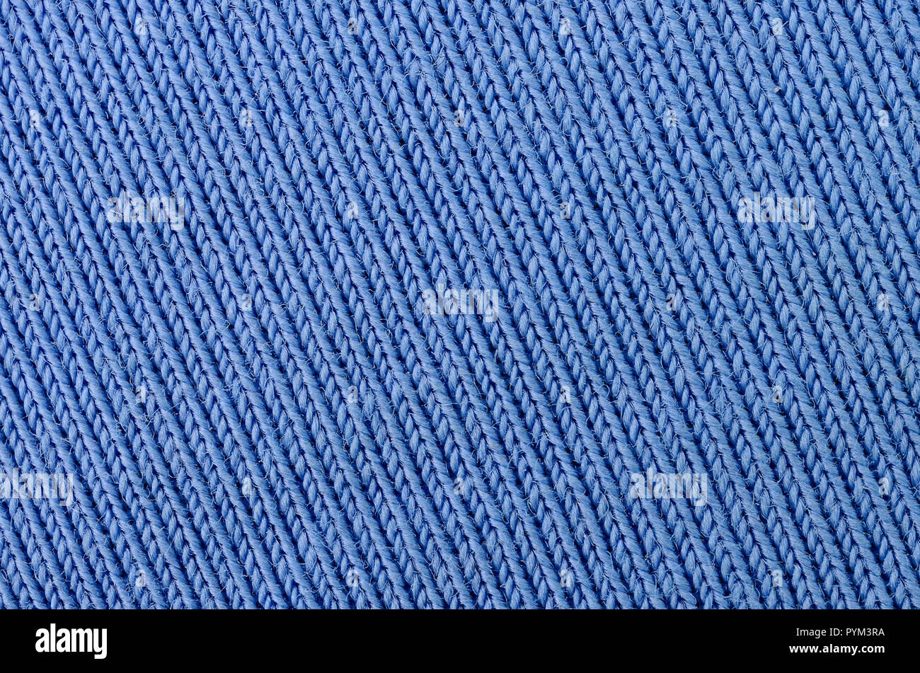 The texture of the fabric in blue color. Material for making shirts and ...