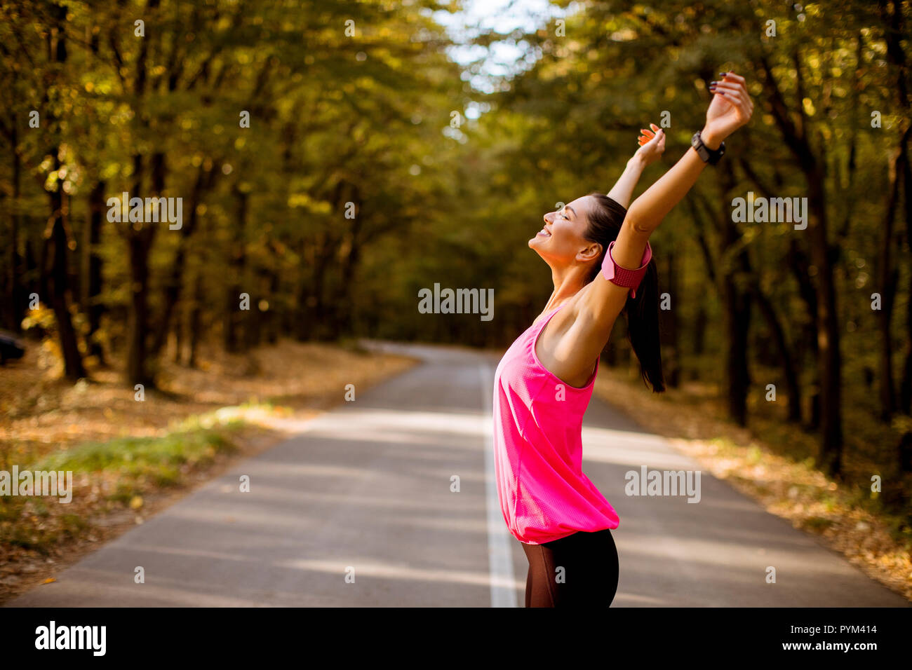 Female runner during outdoor workout in beautiful autumn mountain ...